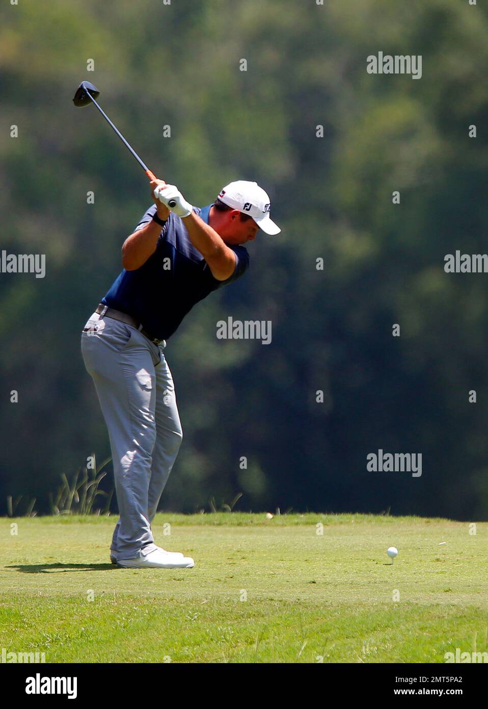 Scott Stallings tees off on the fifth hole in the final round of the ...