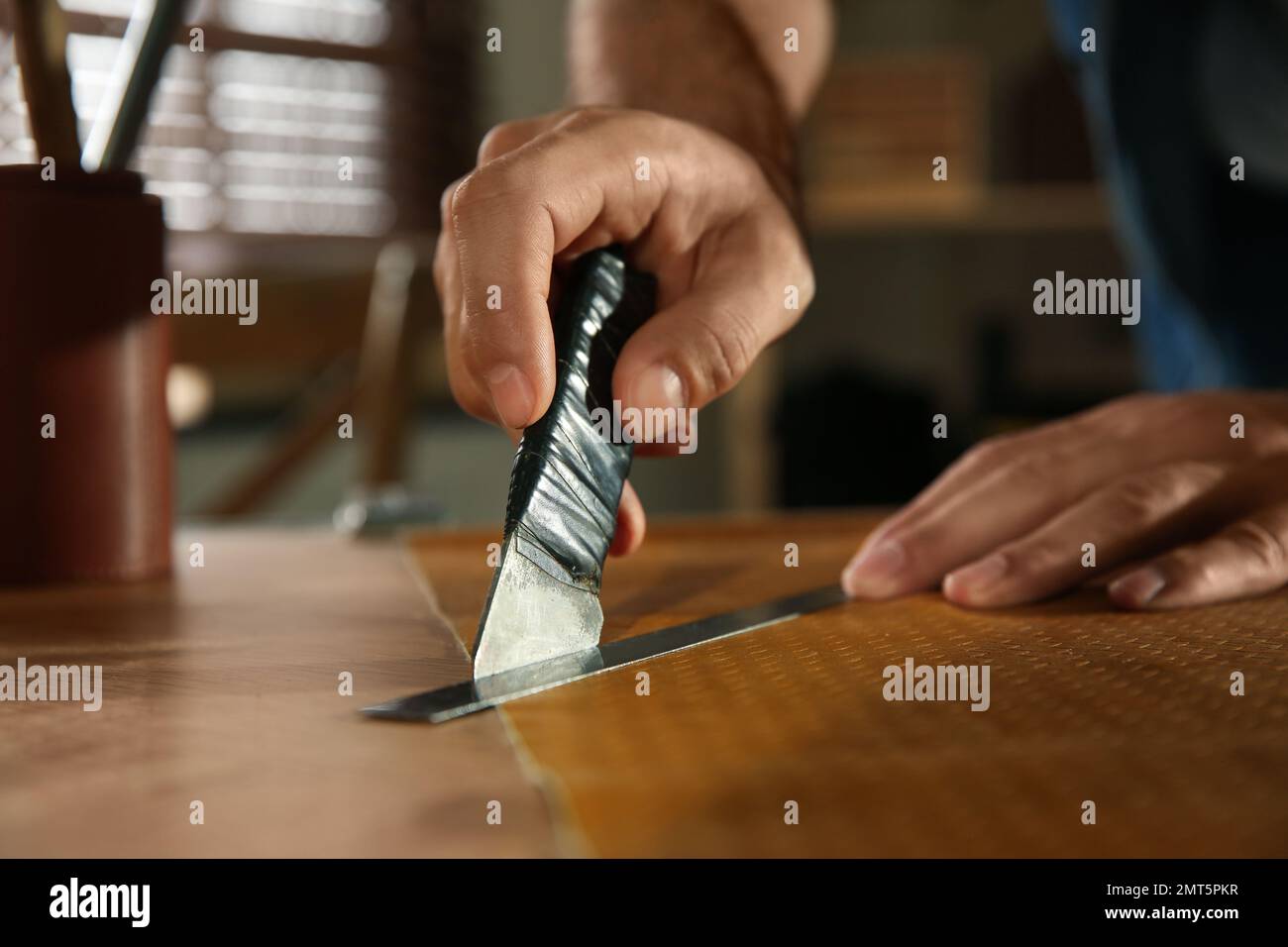 Leather cutting knife hi-res stock photography and images - Alamy