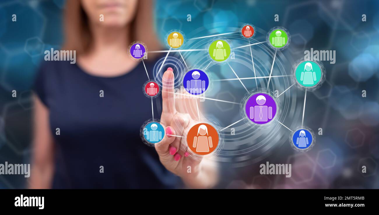 Woman touching a social network concept on a touch screen with her ...