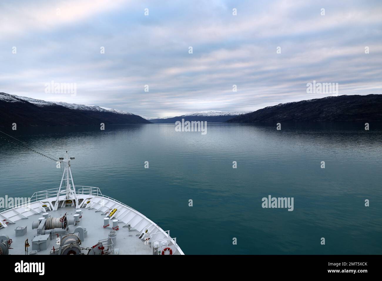 Mountain range in a waterway of the Kangerlussuaq fjord Greenland ...