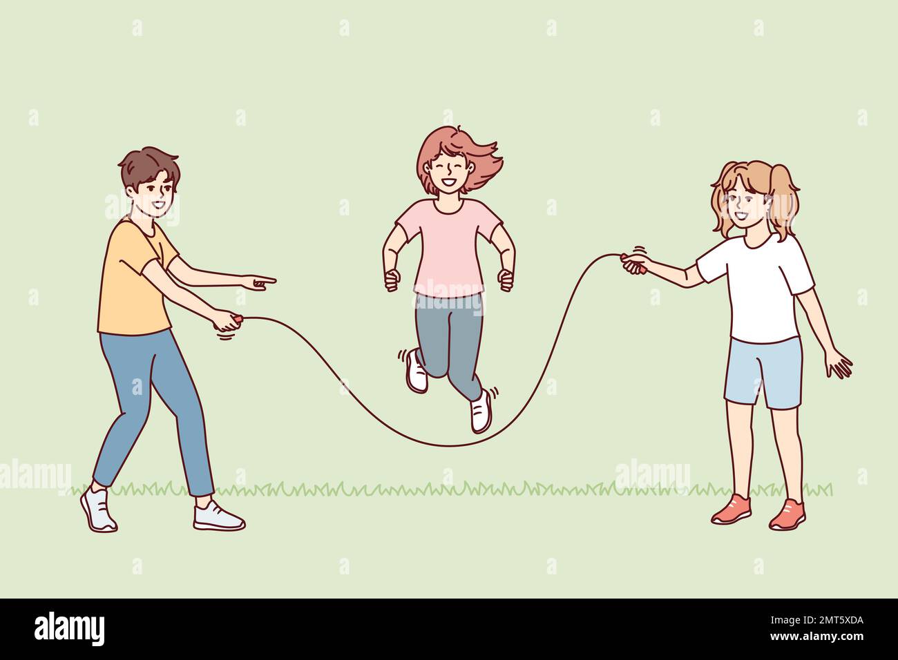 Teenage children stand on lawn jumping rope relaxing during summer ...