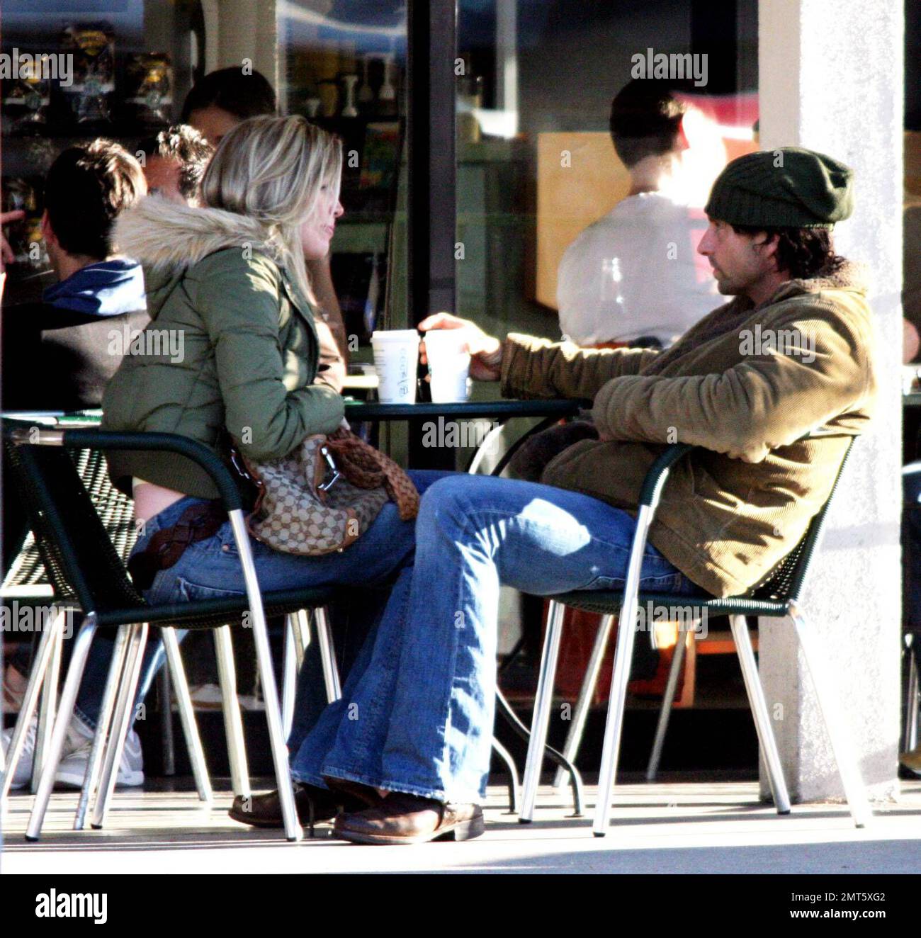 Niklas Soderblom and his girlfriend get cozy over a cup of coffee and ...