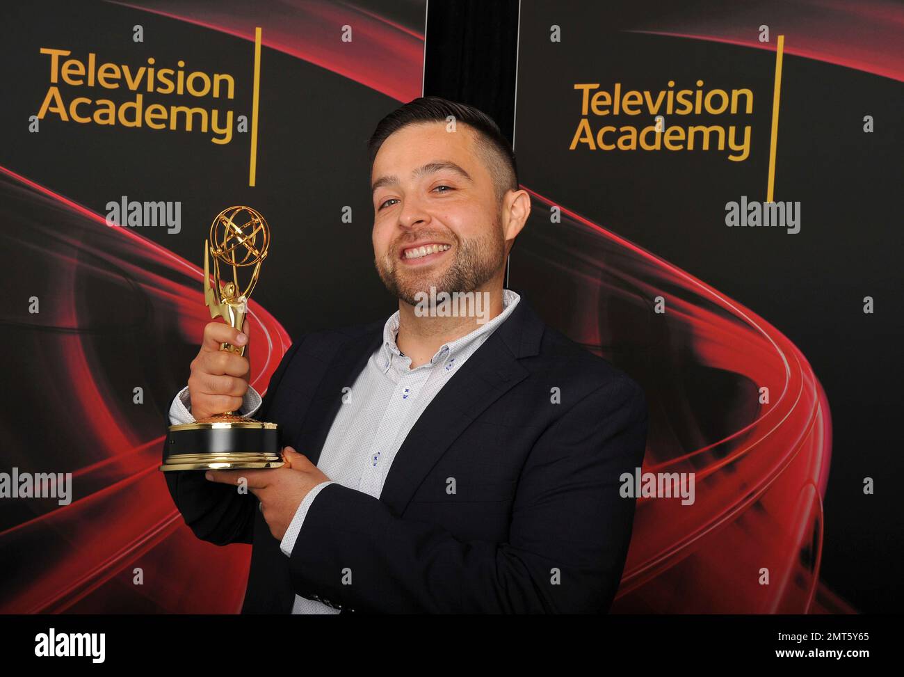 EXCLUSIVE - Saul Arredondo poses for a portrait with the Emmy for ...