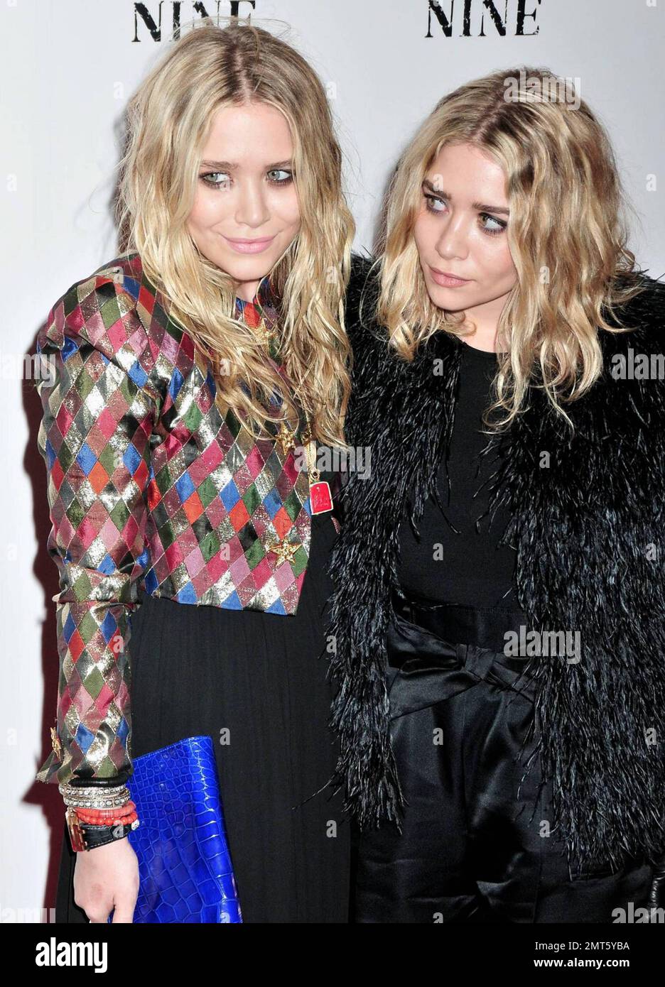 Mary and Kate Olsen at the premiere of Nine held at the Ziegfeld ...