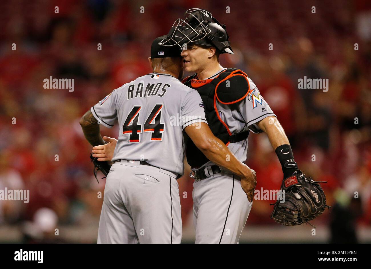 Miami Marlins relief pitcher AJ Ramos (44) and catcher J.T. Realmuto ...
