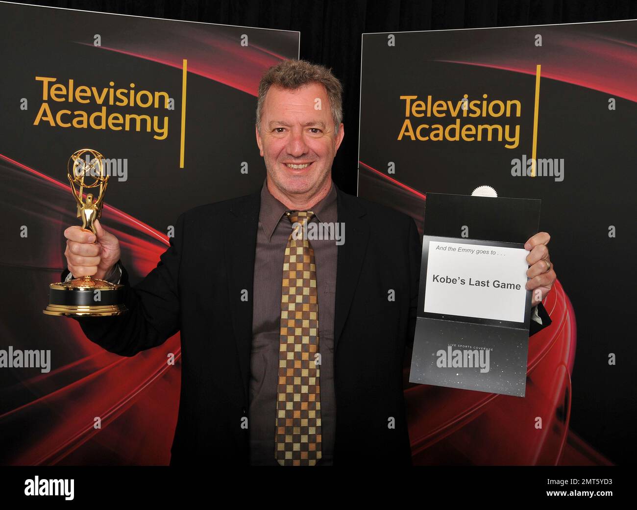 EXCLUSIVE - Jerry Weinstein poses for a portrait with the Emmy for live ...