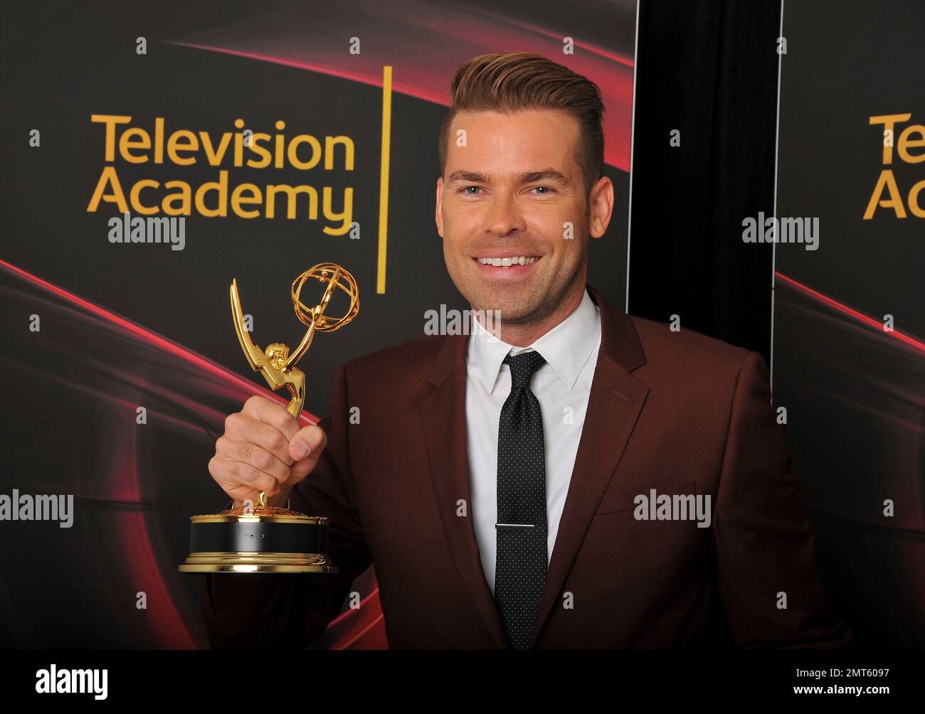 EXCLUSIVE - Derrick Shore poses for a portrait with the Emmy for ...