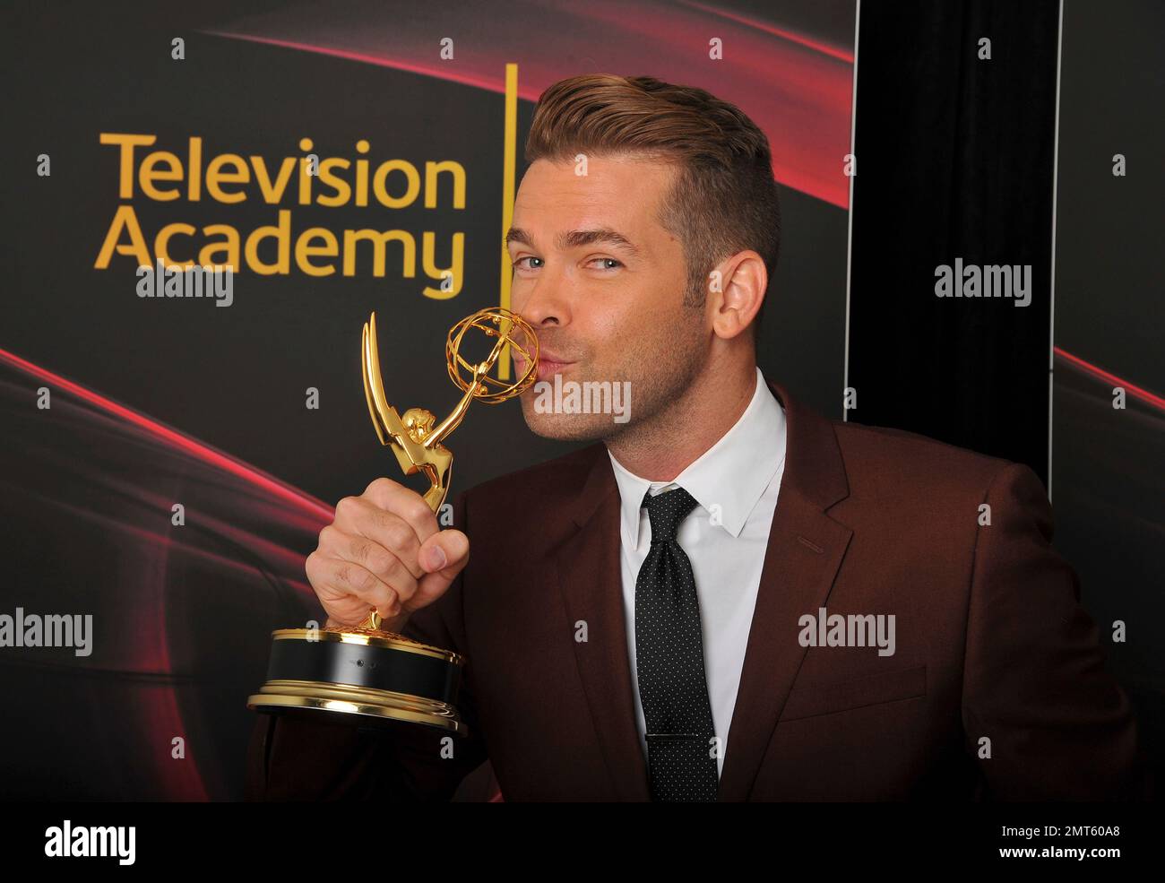 EXCLUSIVE - Derrick Shore poses for a portrait with the Emmy for ...