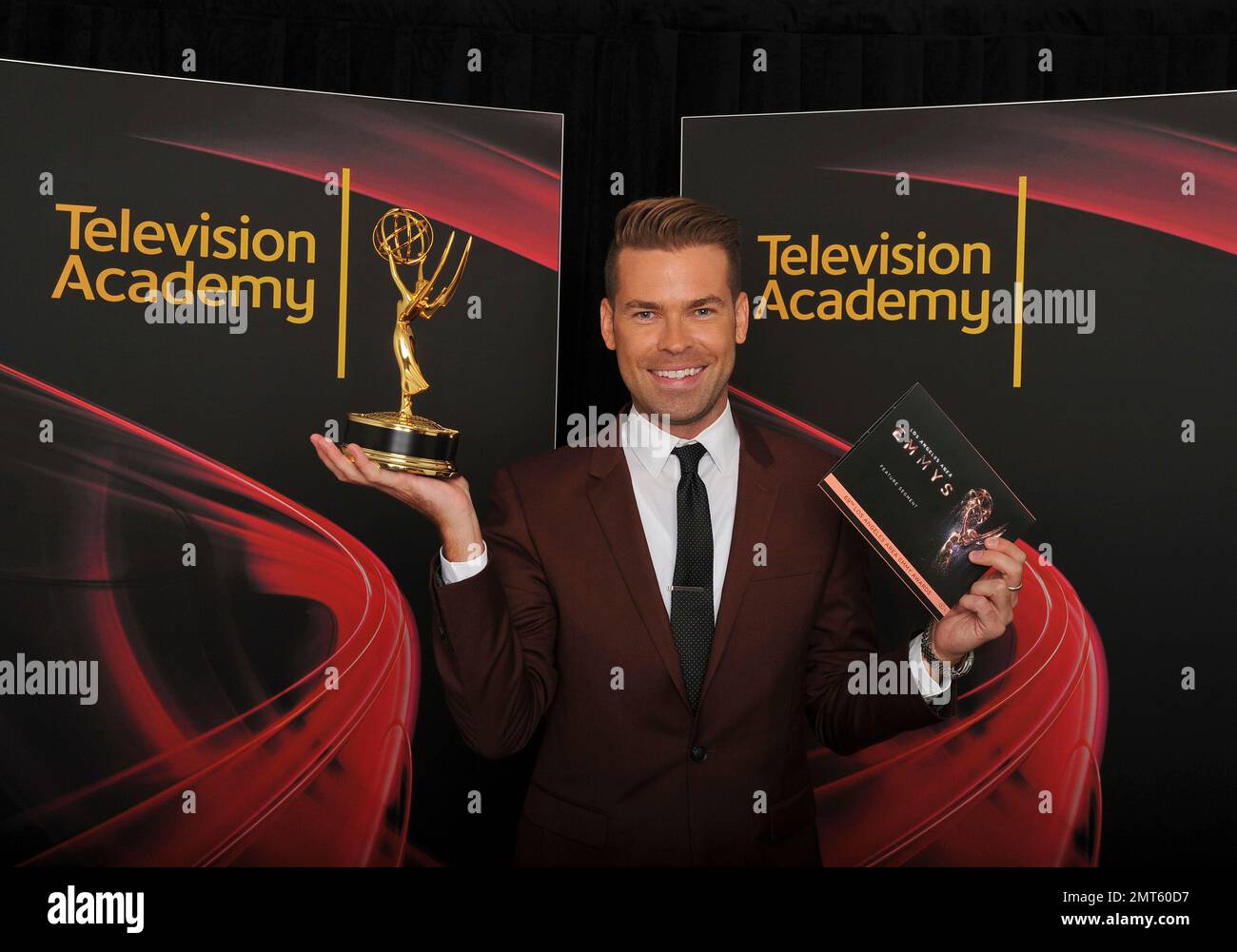 EXCLUSIVE - Derrick Shore poses for a portrait with the Emmy for ...