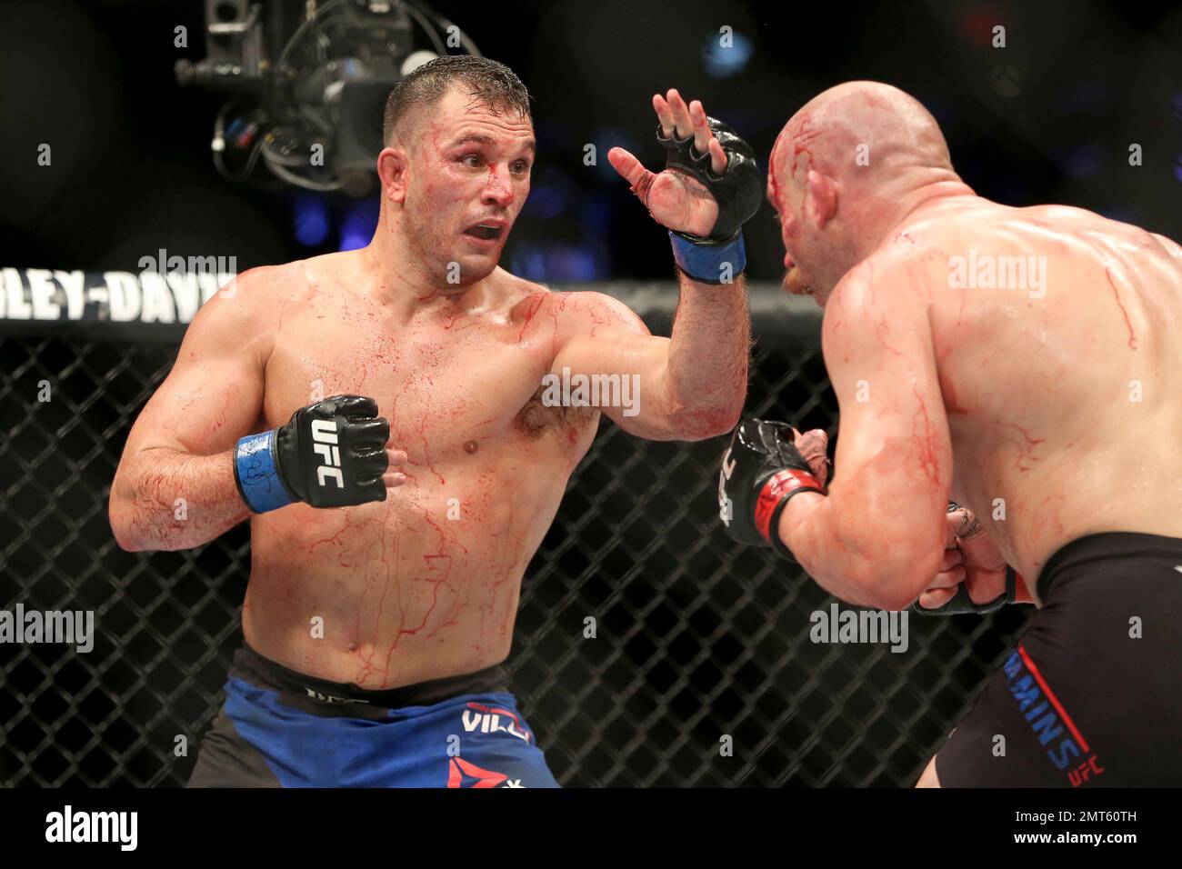 Gian Villante, left, in action against Patrick Cummins during their ...