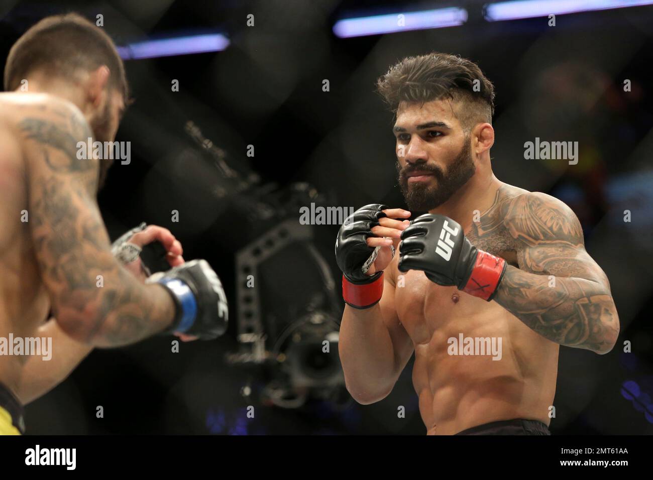 Lyman Good in action against Elizeu Zaleski dos Santos during their ...