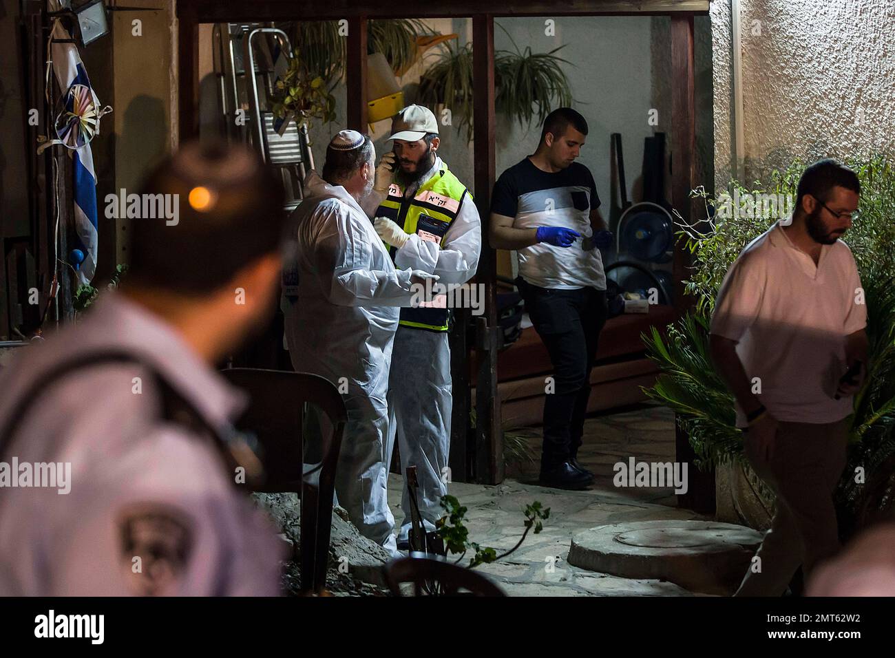 Israeli ZAKA emergency response members are seen in the Israeli ...