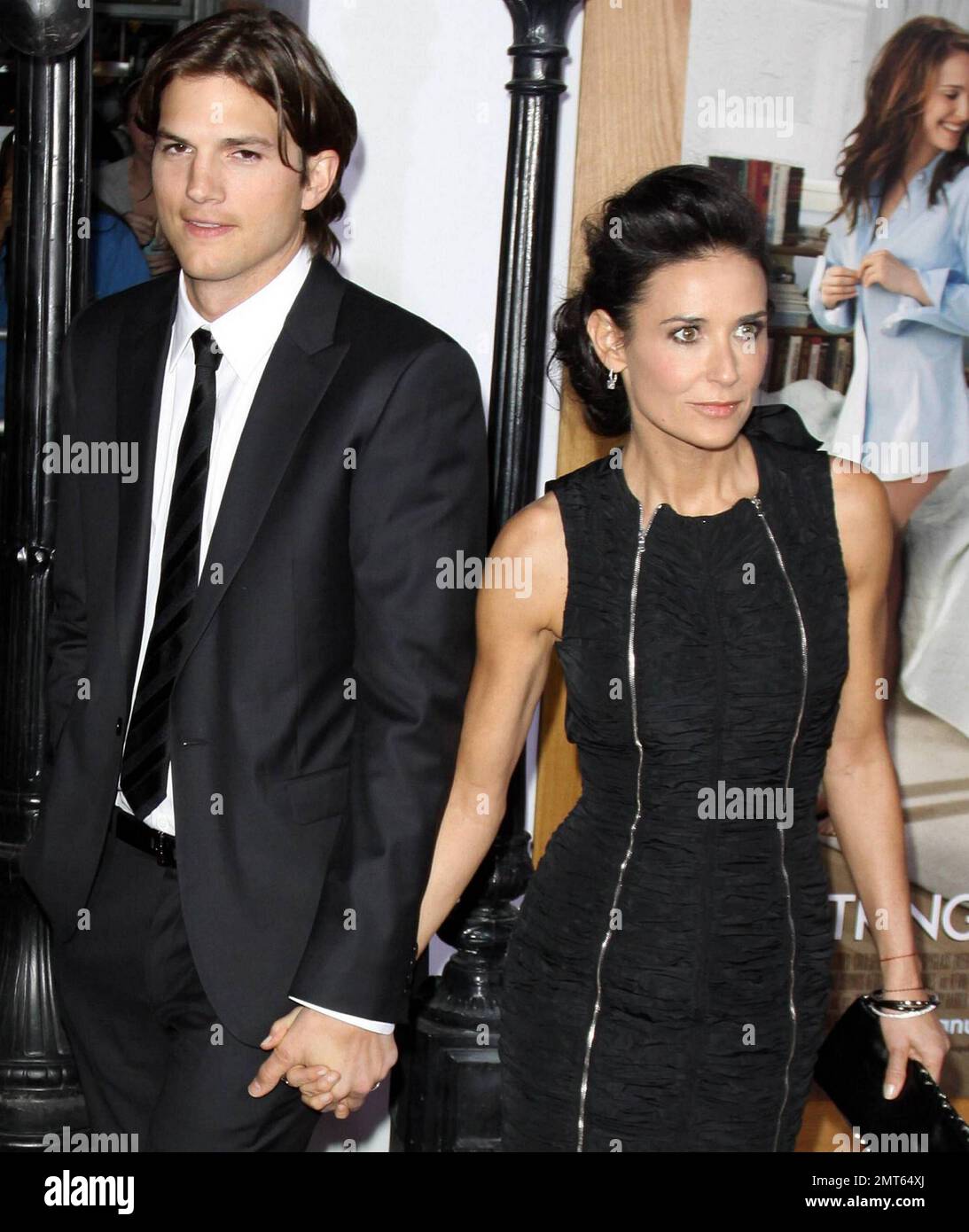 Husband and wife Ashton Kutcher, 32, and Demi Moore, 48, hold hands on ...