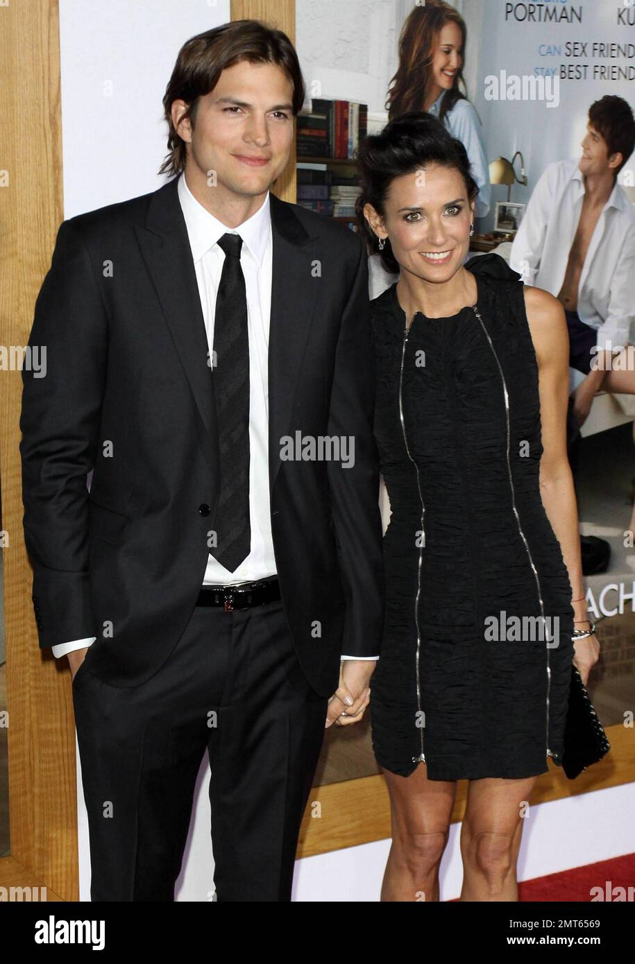 Husband and wife Ashton Kutcher, 32, and Demi Moore, 48, hold hands on ...