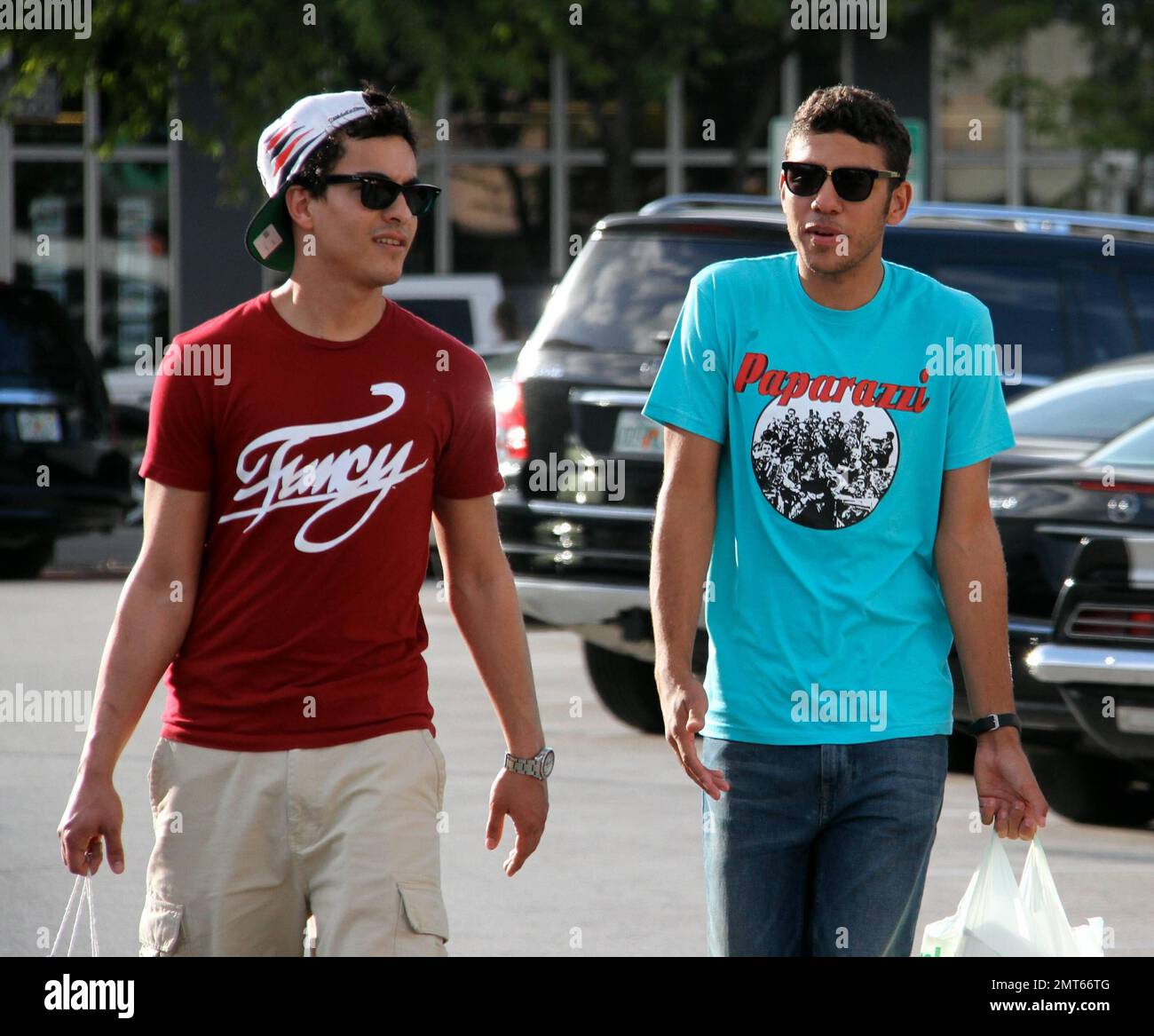 Noah Becker looks ready for his close-up with the Paparazzi by donning ...