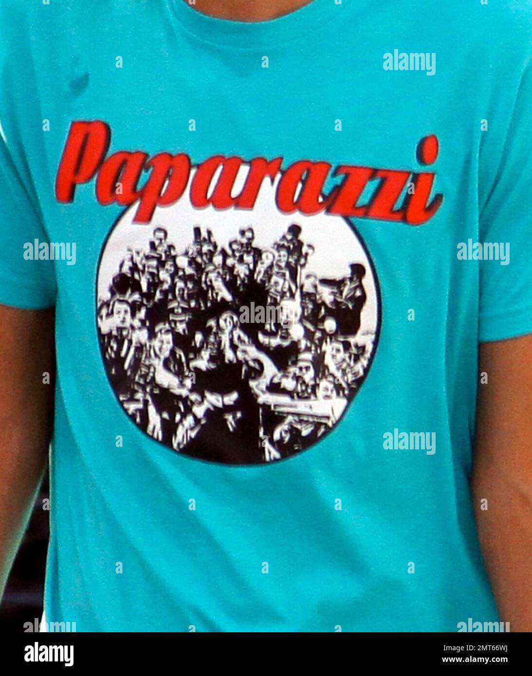 Noah Becker looks ready for his close-up with the Paparazzi by donning ...