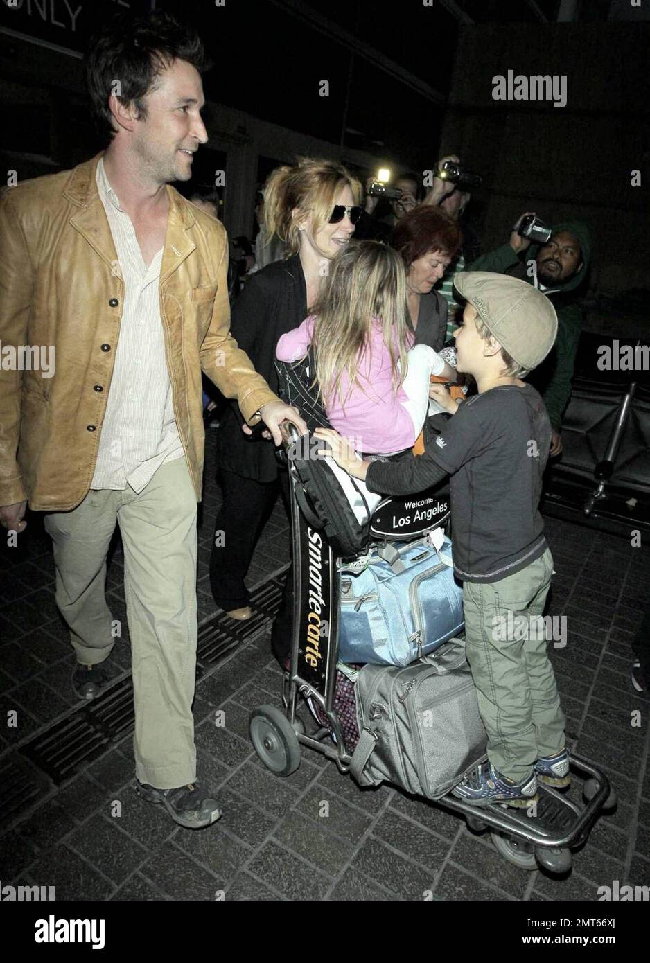 "ER" star Noah Wylie and family arrive stateside at Los Angeles ...