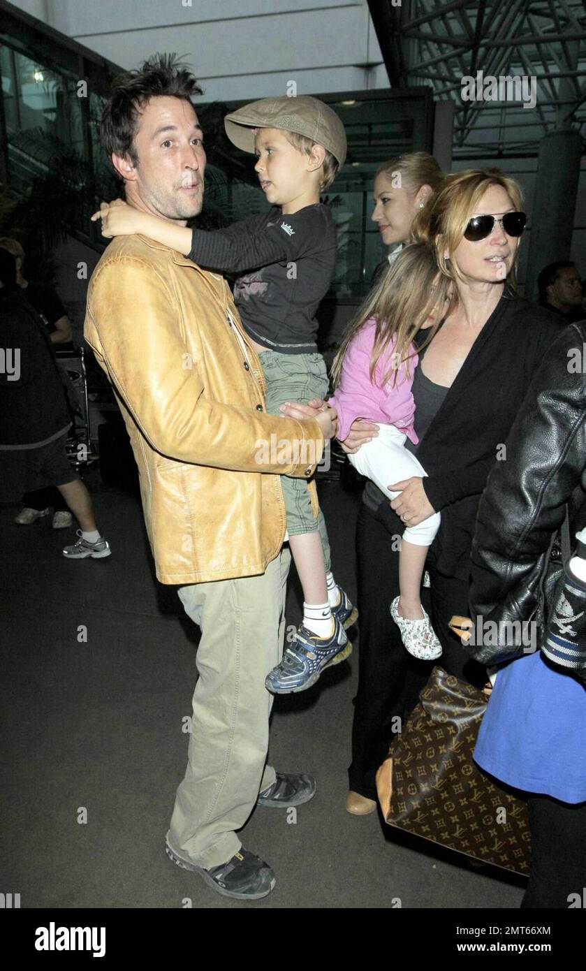 "ER" star Noah Wylie and family arrive stateside at Los Angeles ...