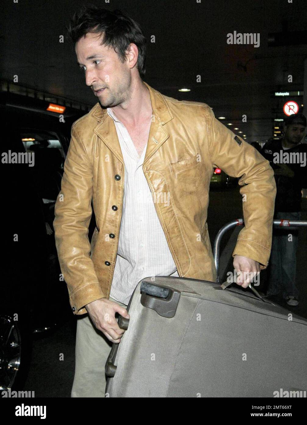 "ER" star Noah Wylie and family arrive stateside at Los Angeles ...