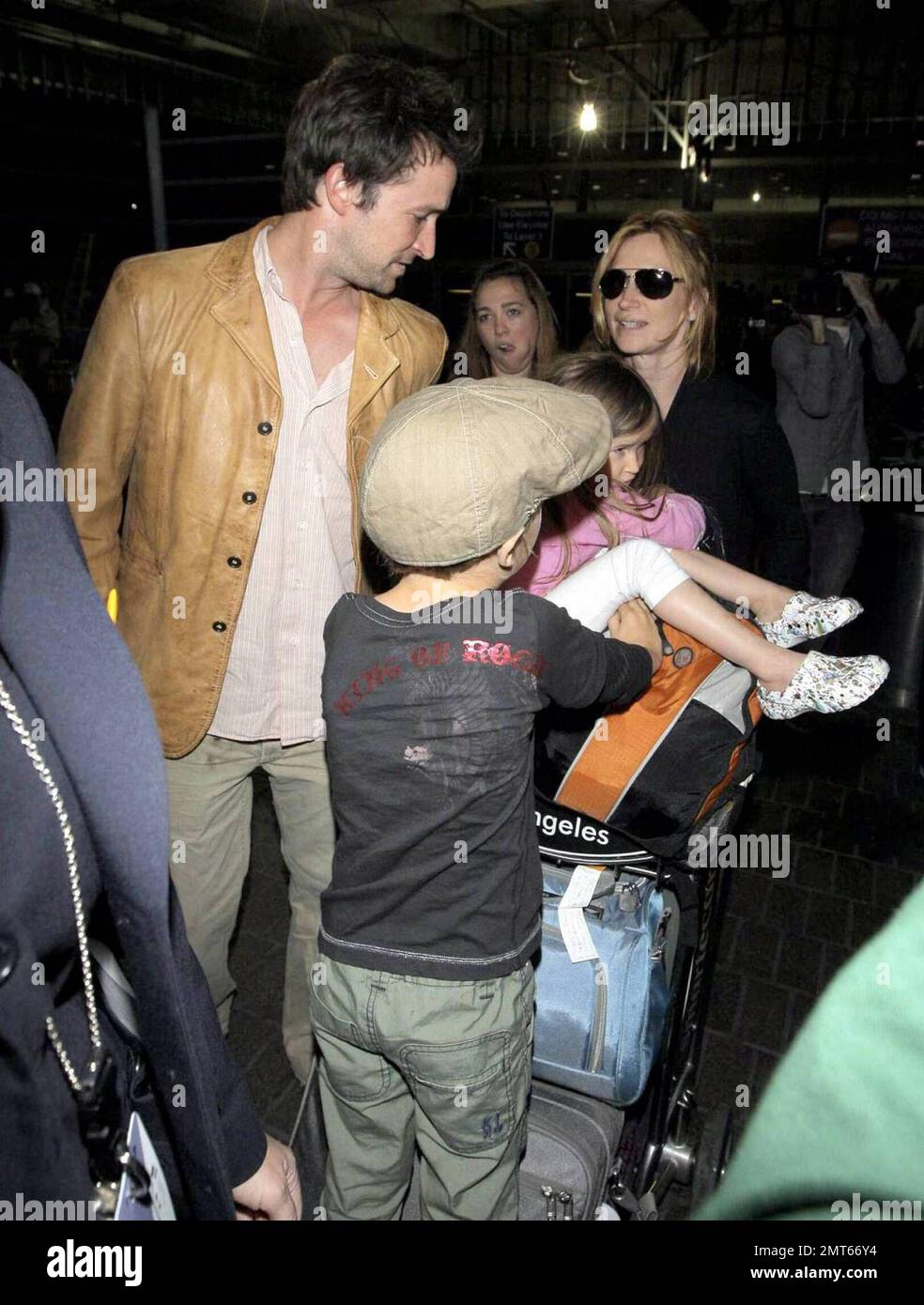 "ER" star Noah Wylie and family arrive stateside at Los Angeles ...