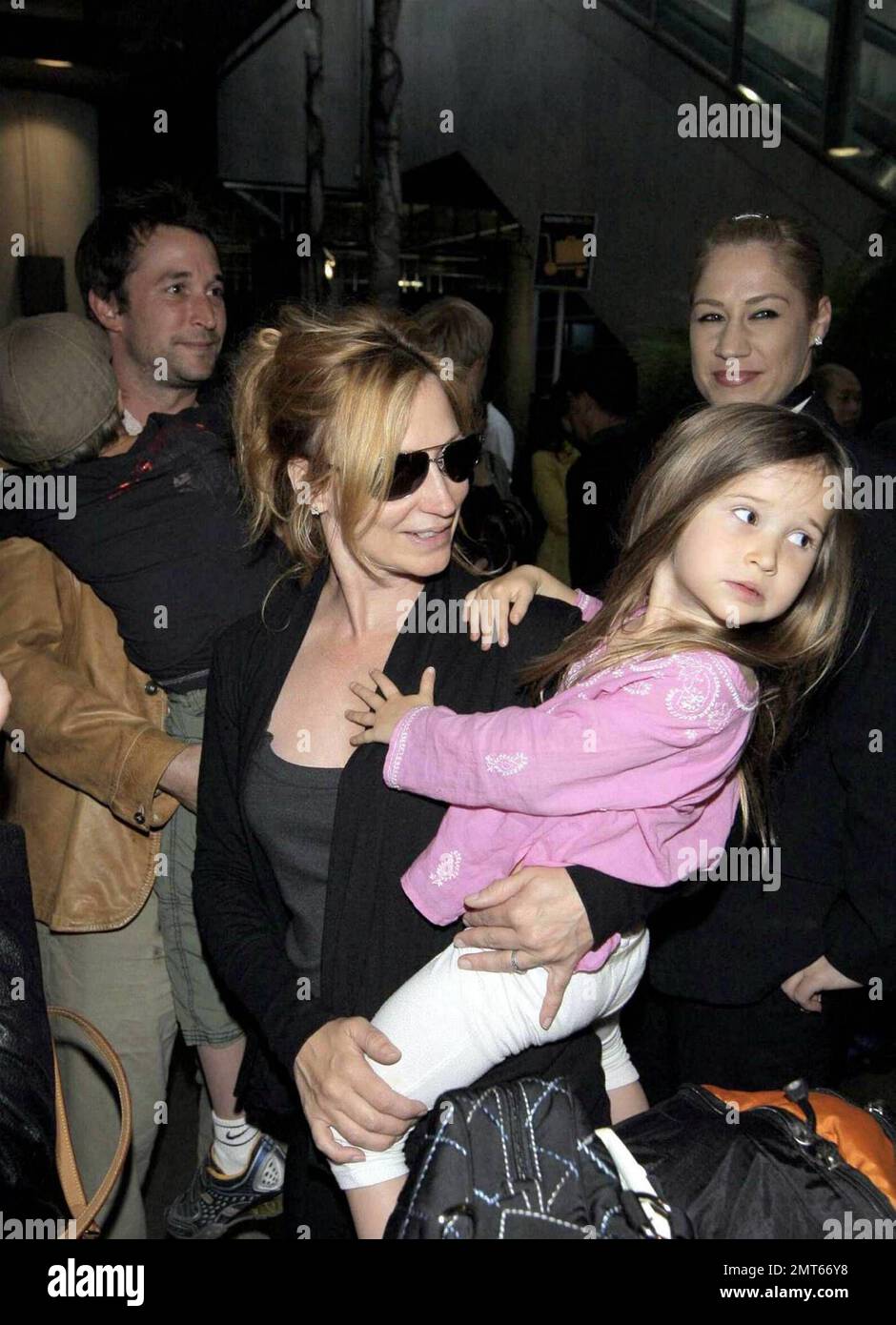 "ER" star Noah Wylie and family arrive stateside at Los Angeles ...