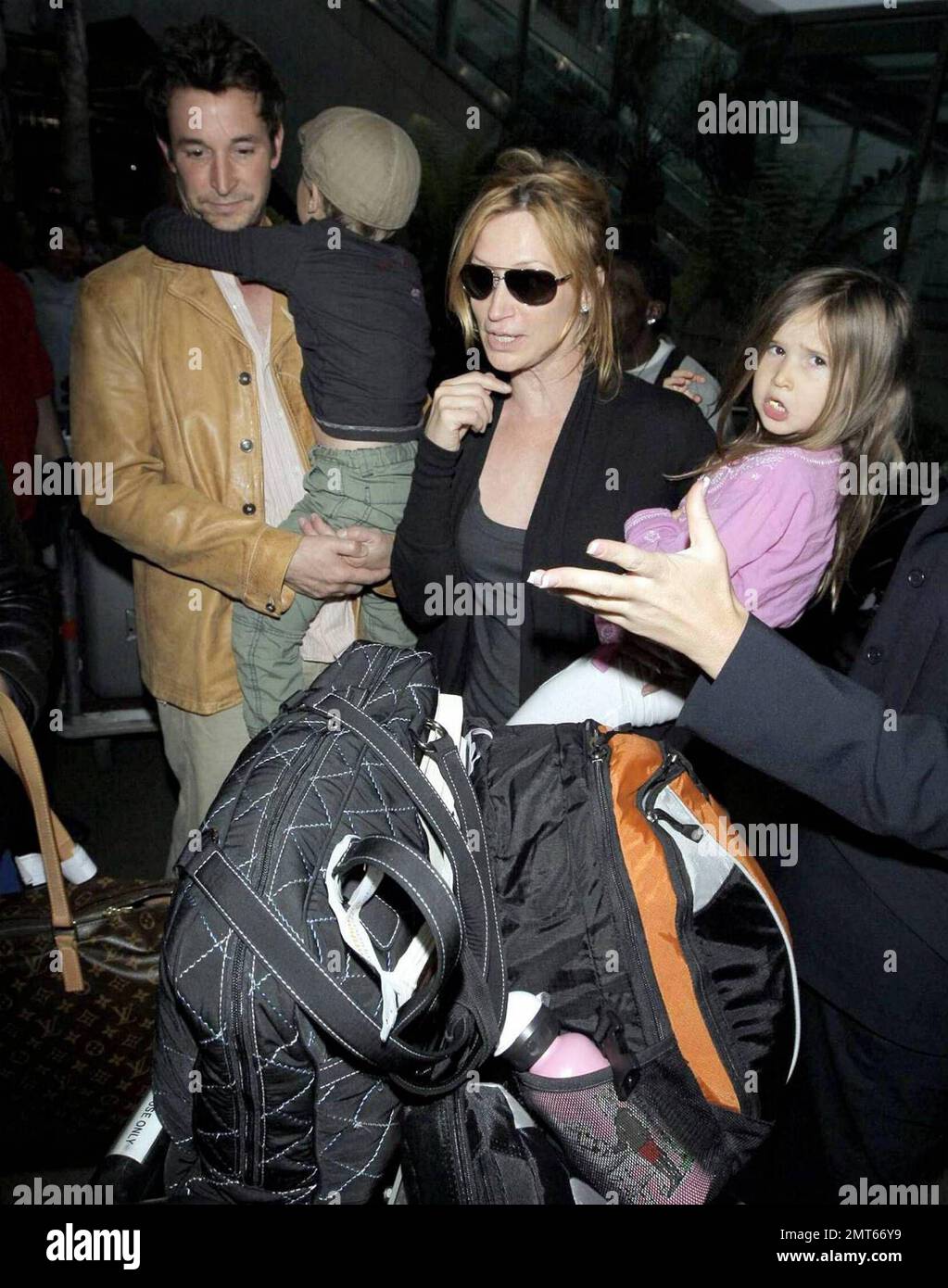 "ER" star Noah Wylie and family arrive stateside at Los Angeles ...