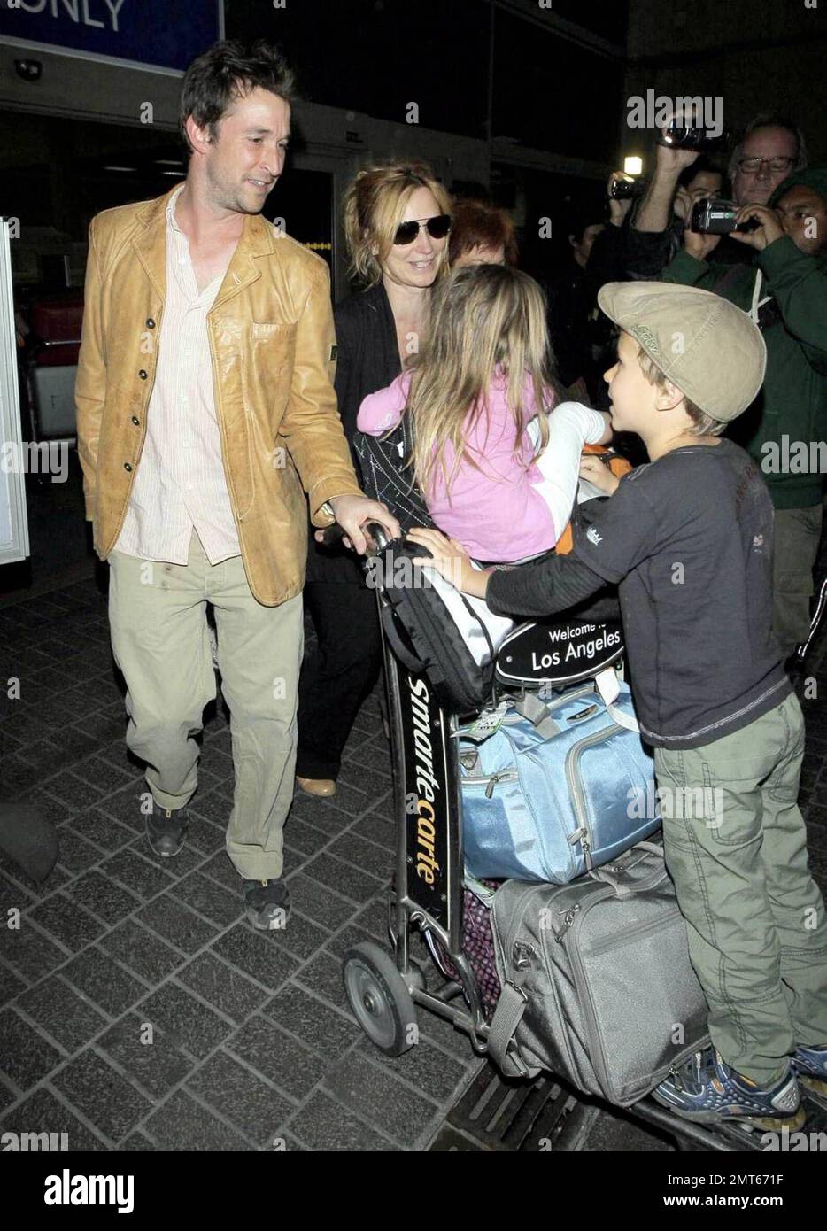 "ER" star Noah Wylie and family arrive stateside at Los Angeles ...
