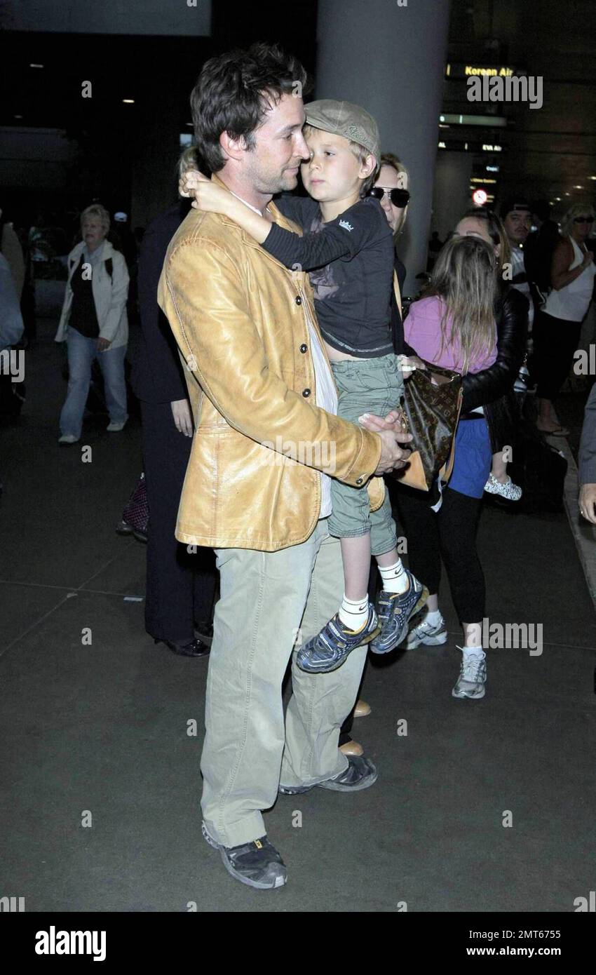 "ER" star Noah Wylie and family arrive stateside at Los Angeles ...