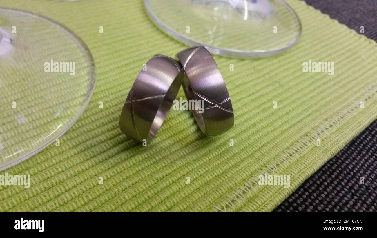 Wedding rings bands in hi-res stock photography and images - Alamy
