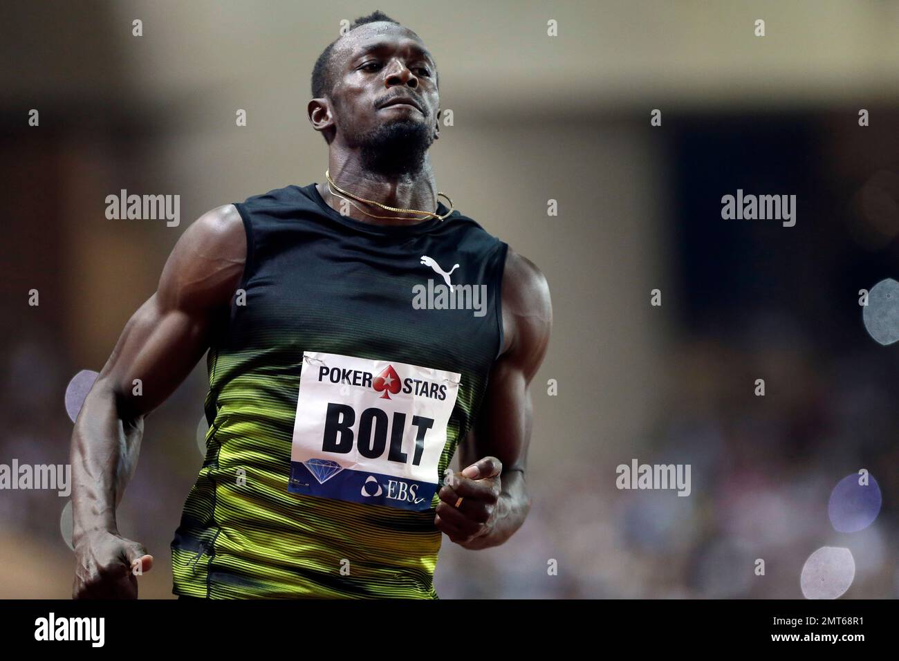 Jamaica's Usain Bolt crosses first the finish line in the men's 100m ...