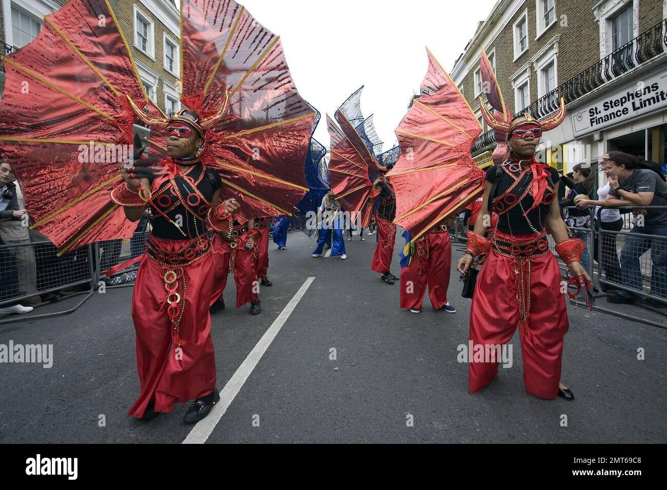 Performers march in a parade at the 2008 Notting Hill Carnival. Taking ...