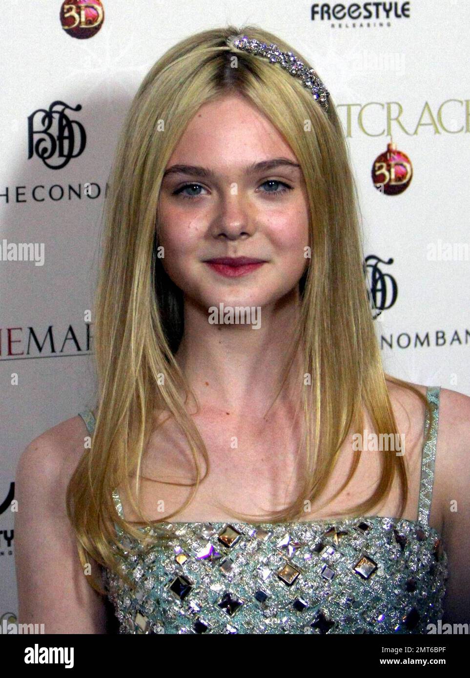 Elle Fanning poses for photographers at the premiere of "The Nutcracker ...