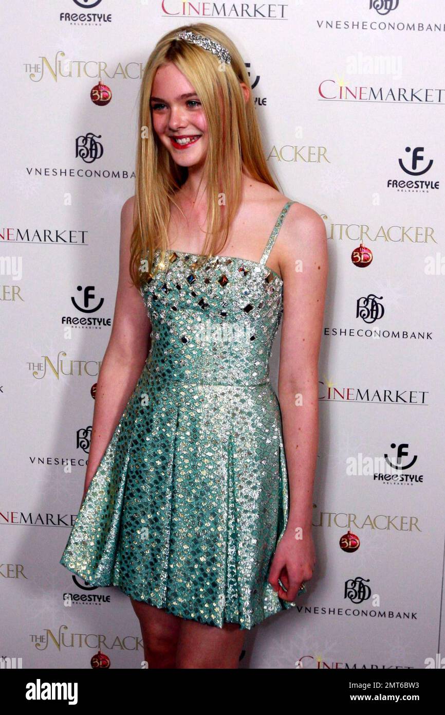 Elle Fanning poses for photographers at the premiere of "The Nutcracker ...