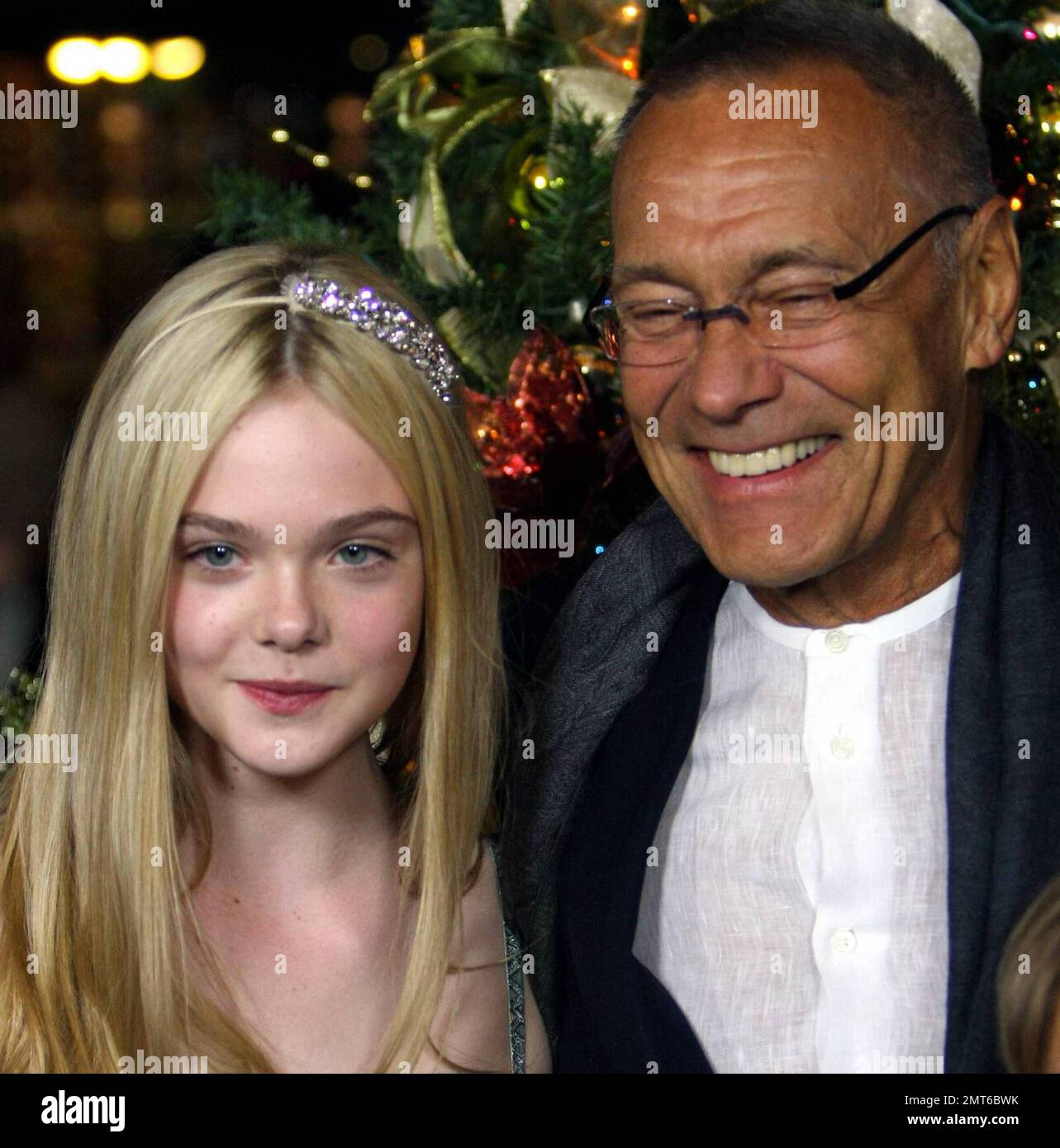 Elle Fanning and Andrei Konchalovsky pose for photographers at the ...