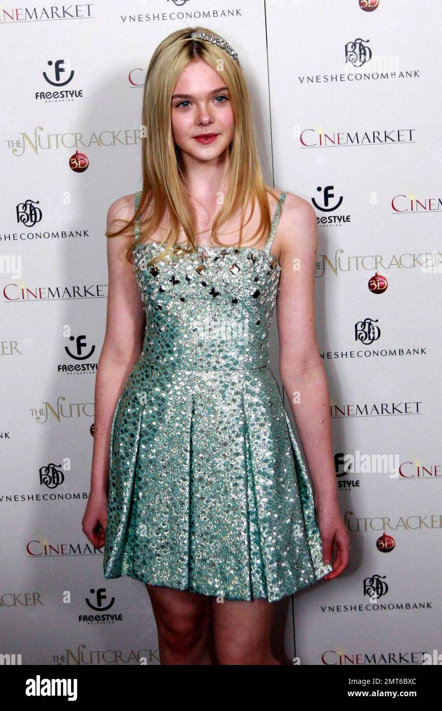 Elle Fanning poses for photographers at the premiere of "The Nutcracker ...