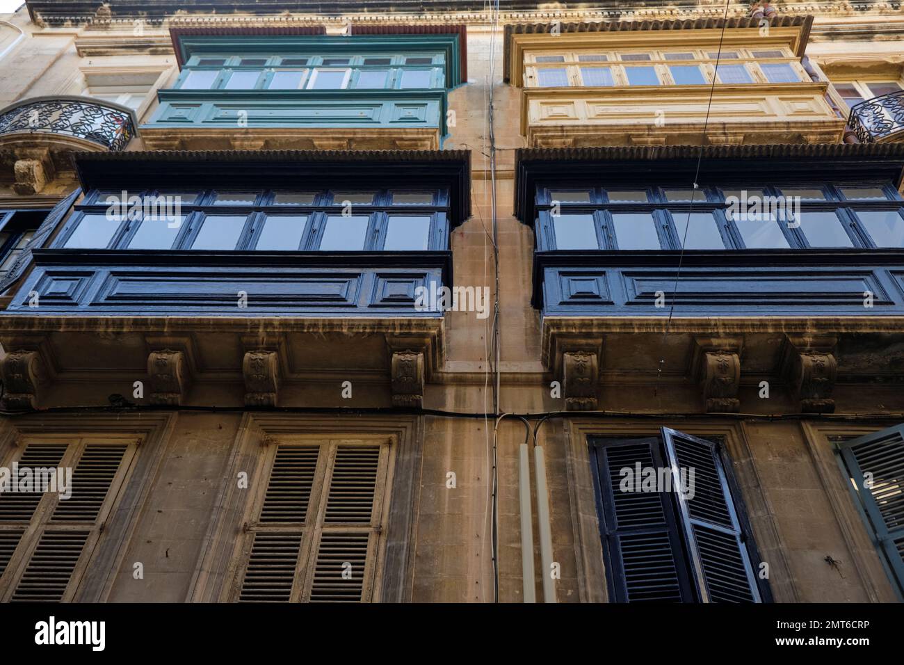 Traditional balconies wooden in a Valletta street - luxury mansions ...