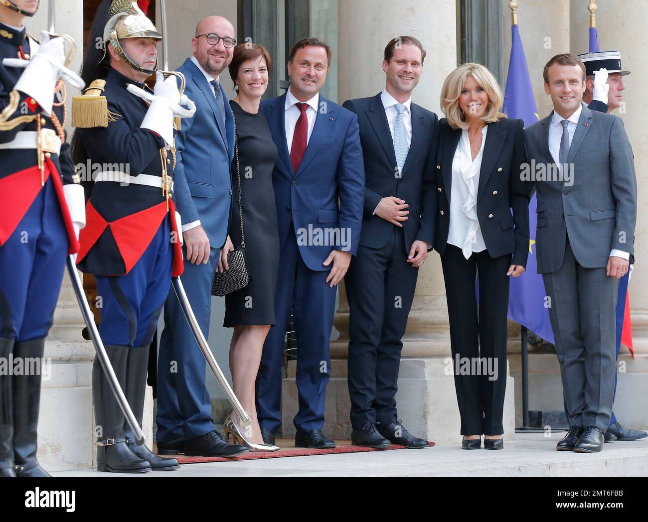 From left to right, Belgian Prime Minister Charles Michel, his wife ...