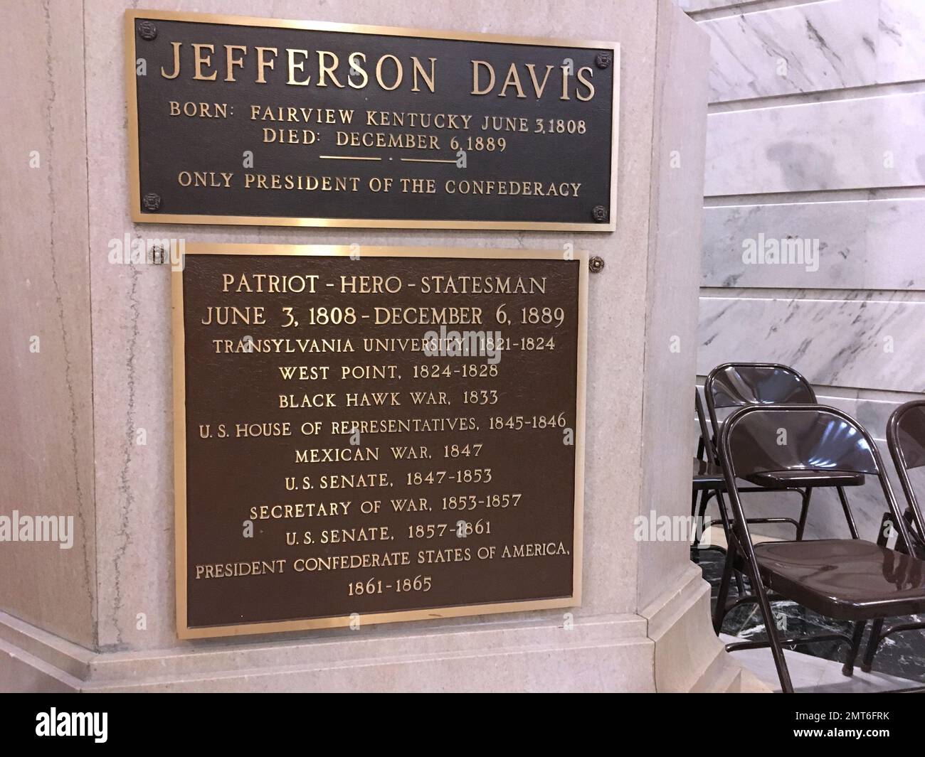 A plaque on a statue of Jefferson Davis in the Kentucky Capitol in ...