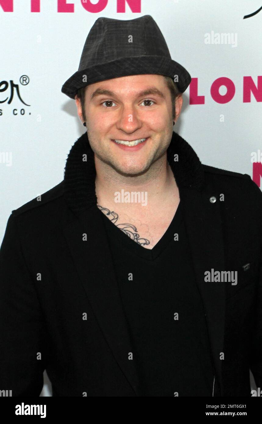 Singer Blake Lewis poses for photographers on the red carpet at NYLON ...