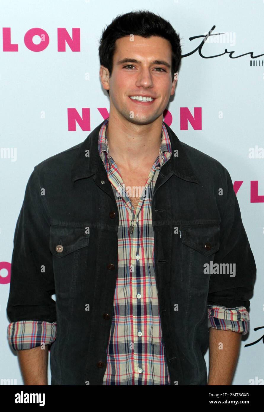Actor Drew Roy poses for photographers on the red carpet at NYLON ...