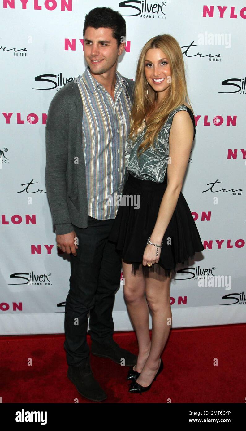 TV personality Whitney Port (R) with boyfriend Ben Nemtin pose for ...