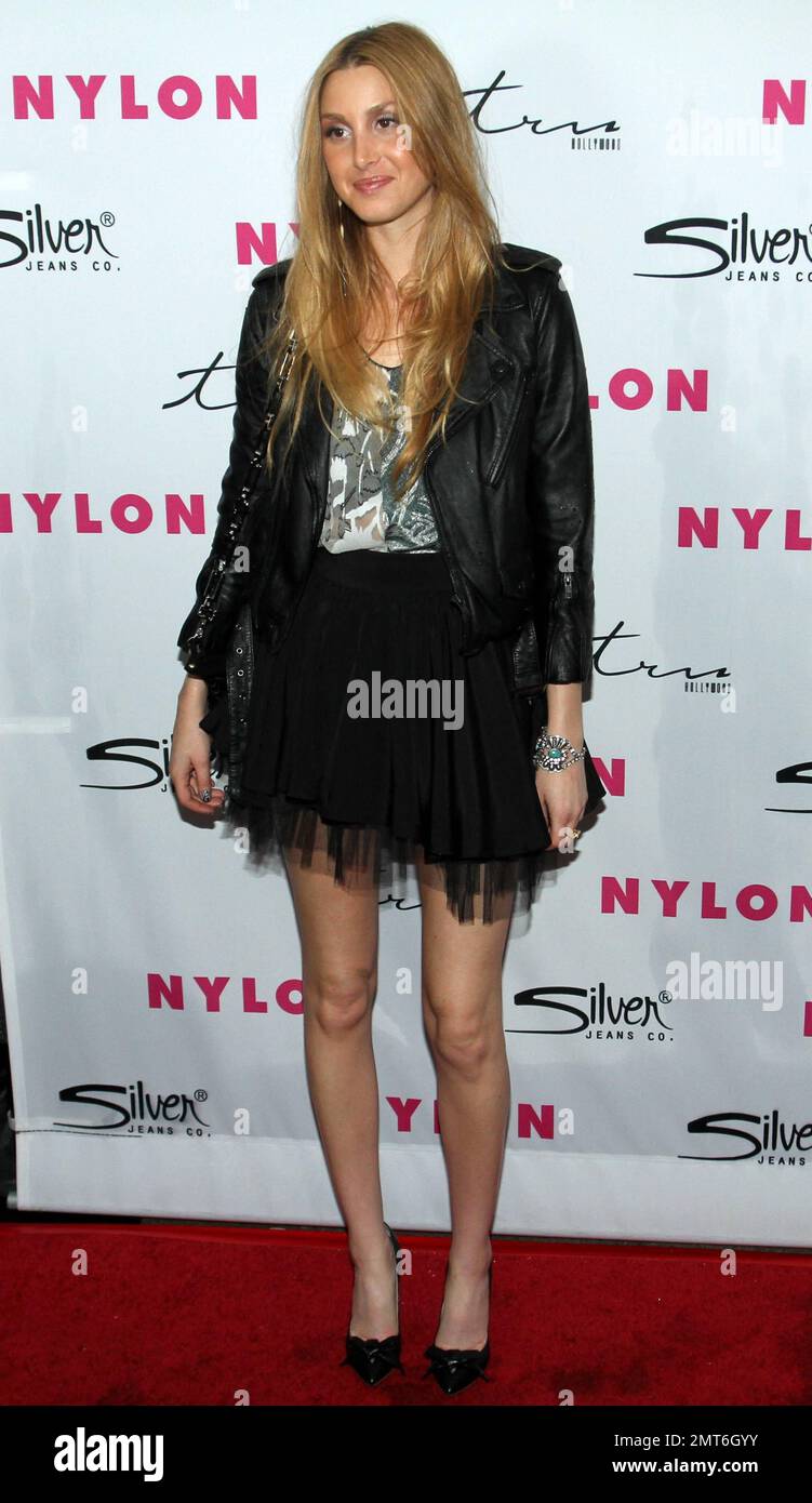 TV personality Whitney Port poses for photographers on the red carpet ...