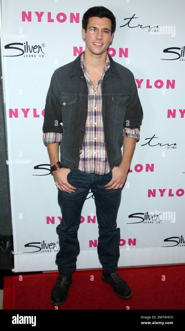 Actor Drew Roy poses for photographers on the red carpet at NYLON ...