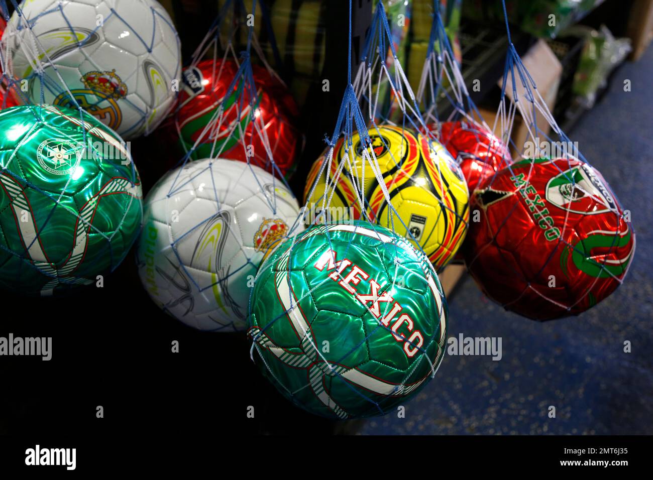 In this Tuesday, July 18, 2017 photo, soccer balls with Mexican colors ...