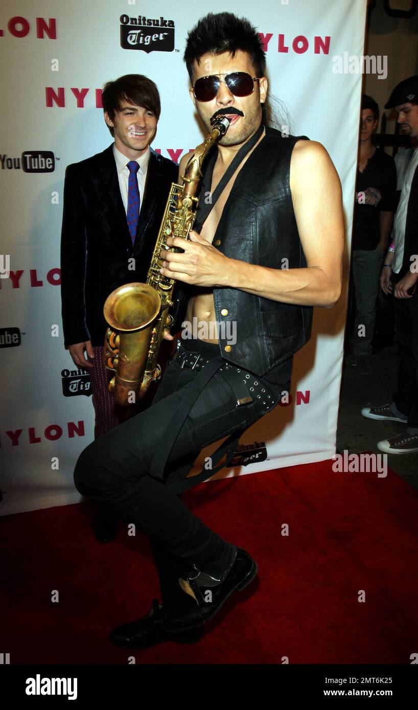 Musician Sergio "Sax Man" Flores arrives at NYLON Magazine's party ...