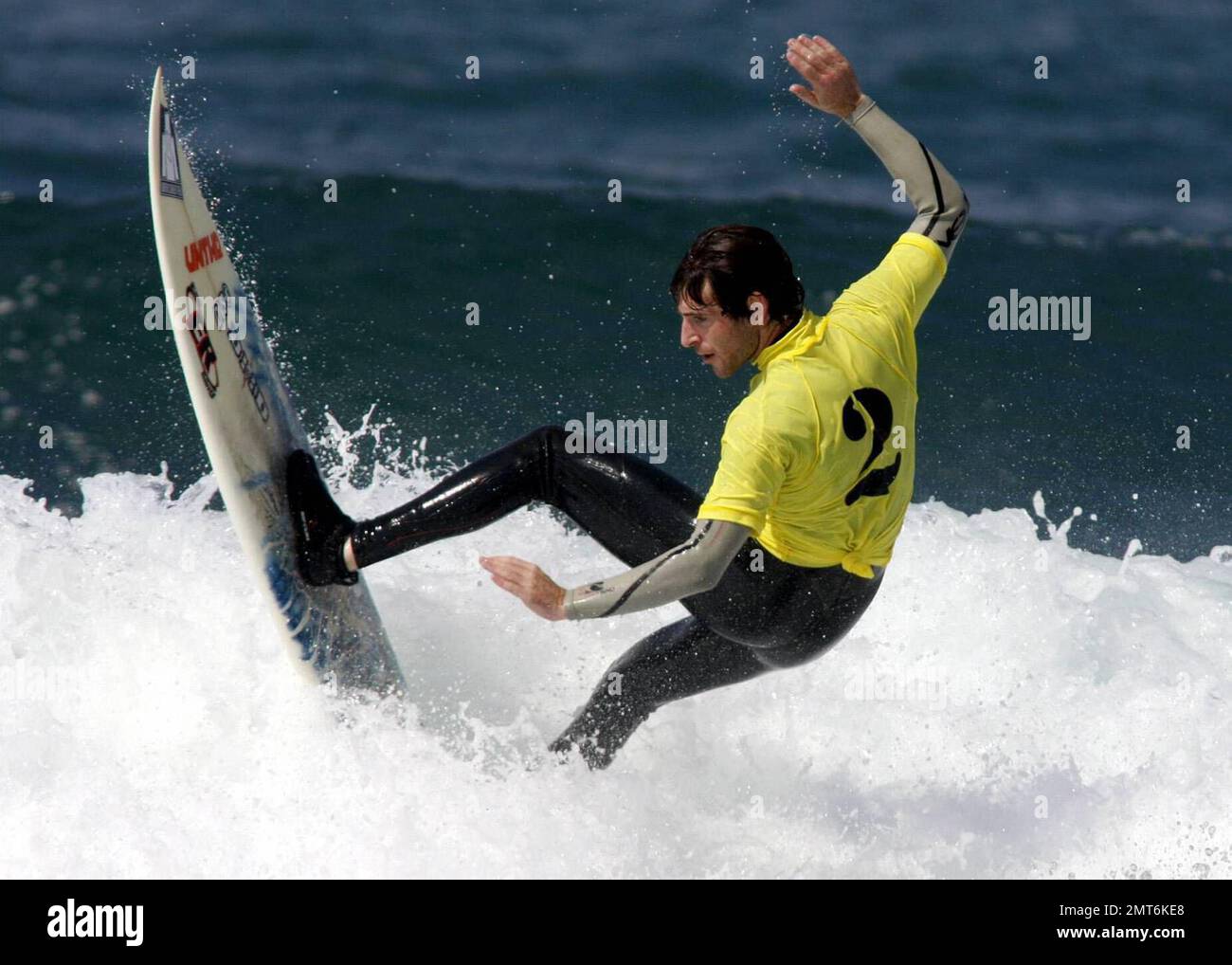 Surfers take part in the Oakley Gang Challenge surf contest at Santa ...