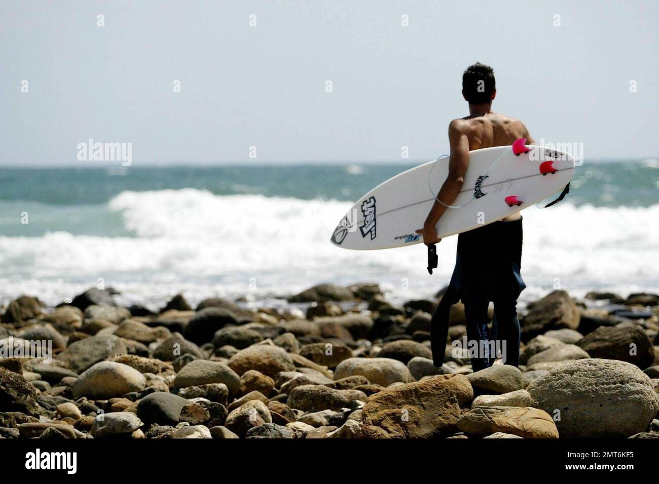 Surfers take part in the Oakley Gang Challenge surf contest at Santa ...
