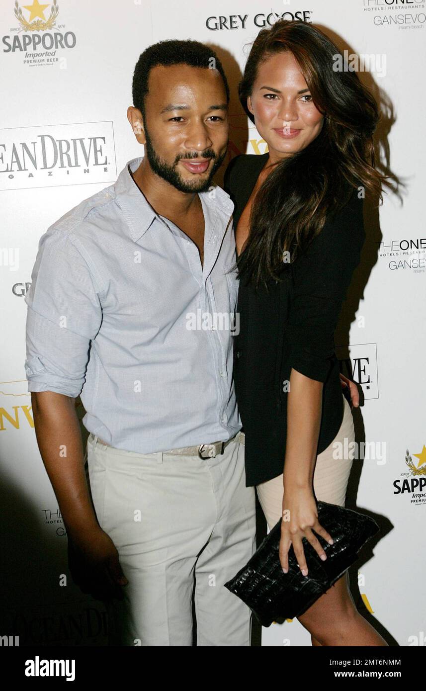 Singer John Legend and his girlfriend model Chrissy Teigen arrive for ...