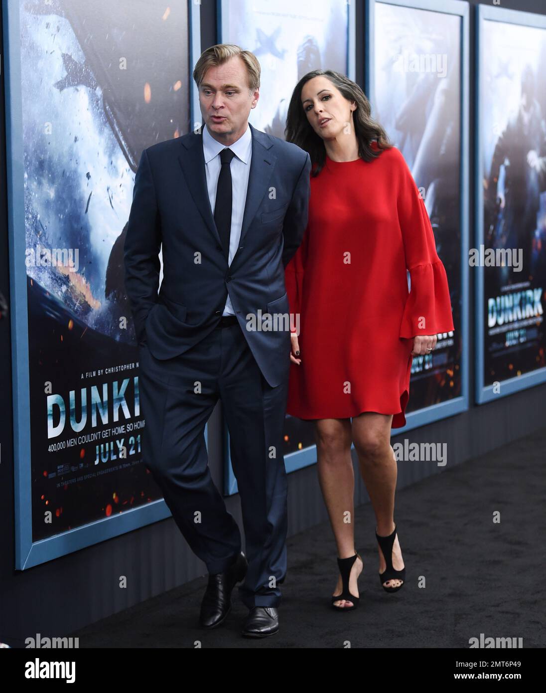 Director, writer and producer Christopher Nolan, left, and wife ...