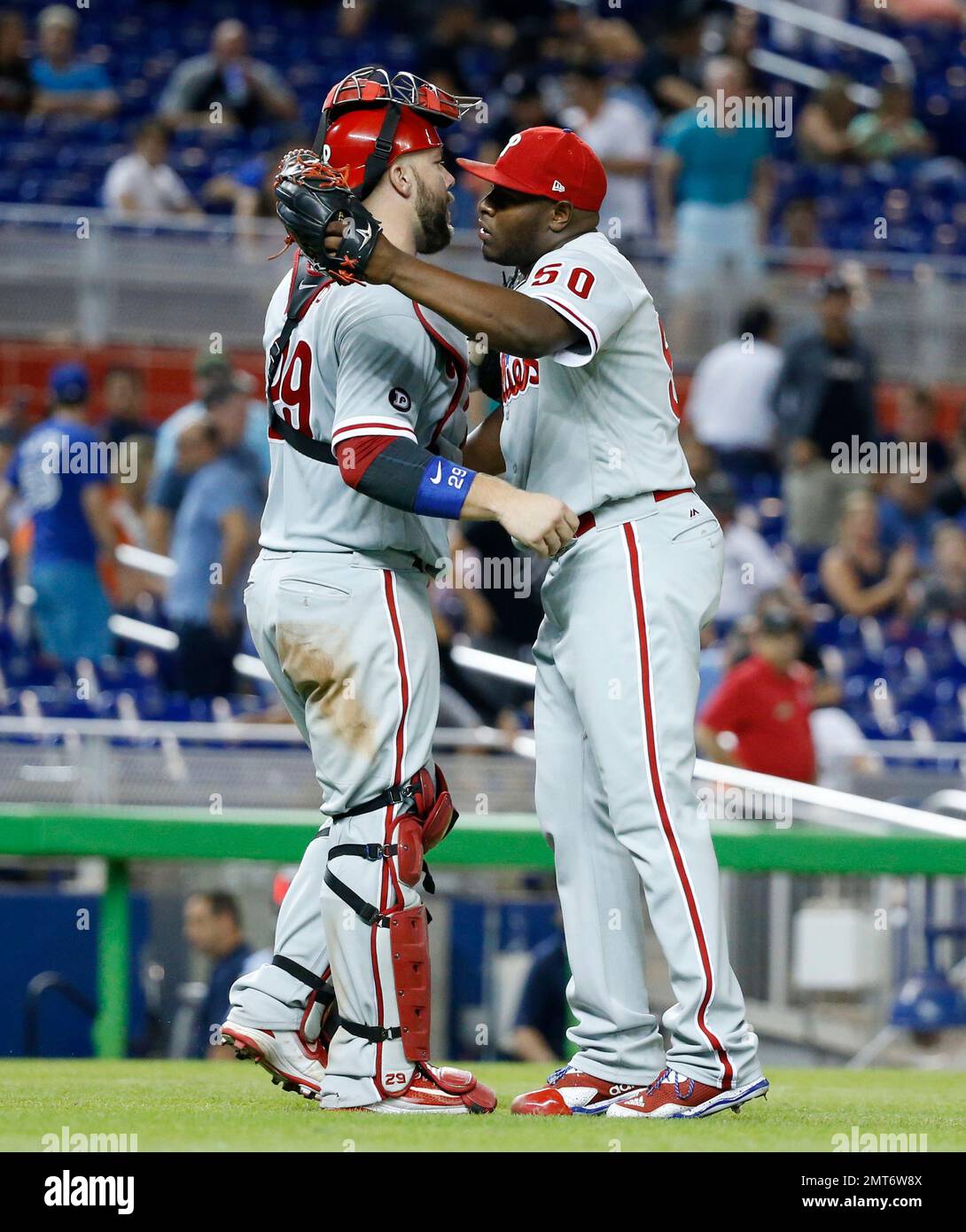 Philadelphia Phillies catcher Cameron Rupp, left, and relief pitcher ...